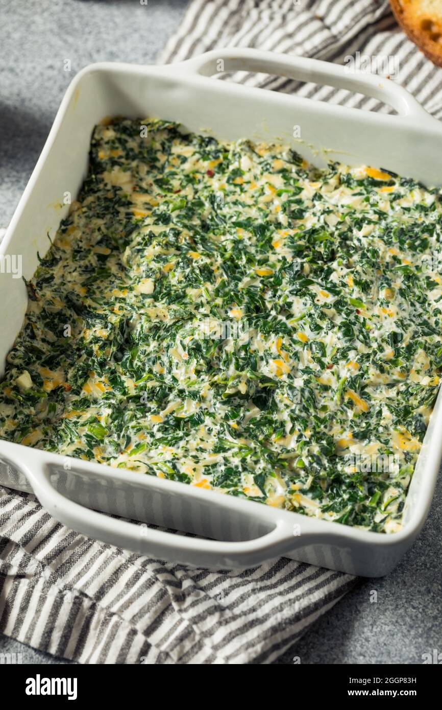 Homemade Creamy Baked Spinach Dip with Toasted Bread Stock Photo - Alamy