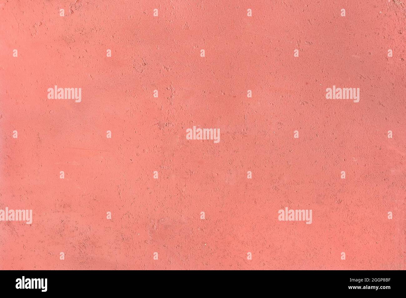 Light red old paint surface on the concrete wall texture background ...