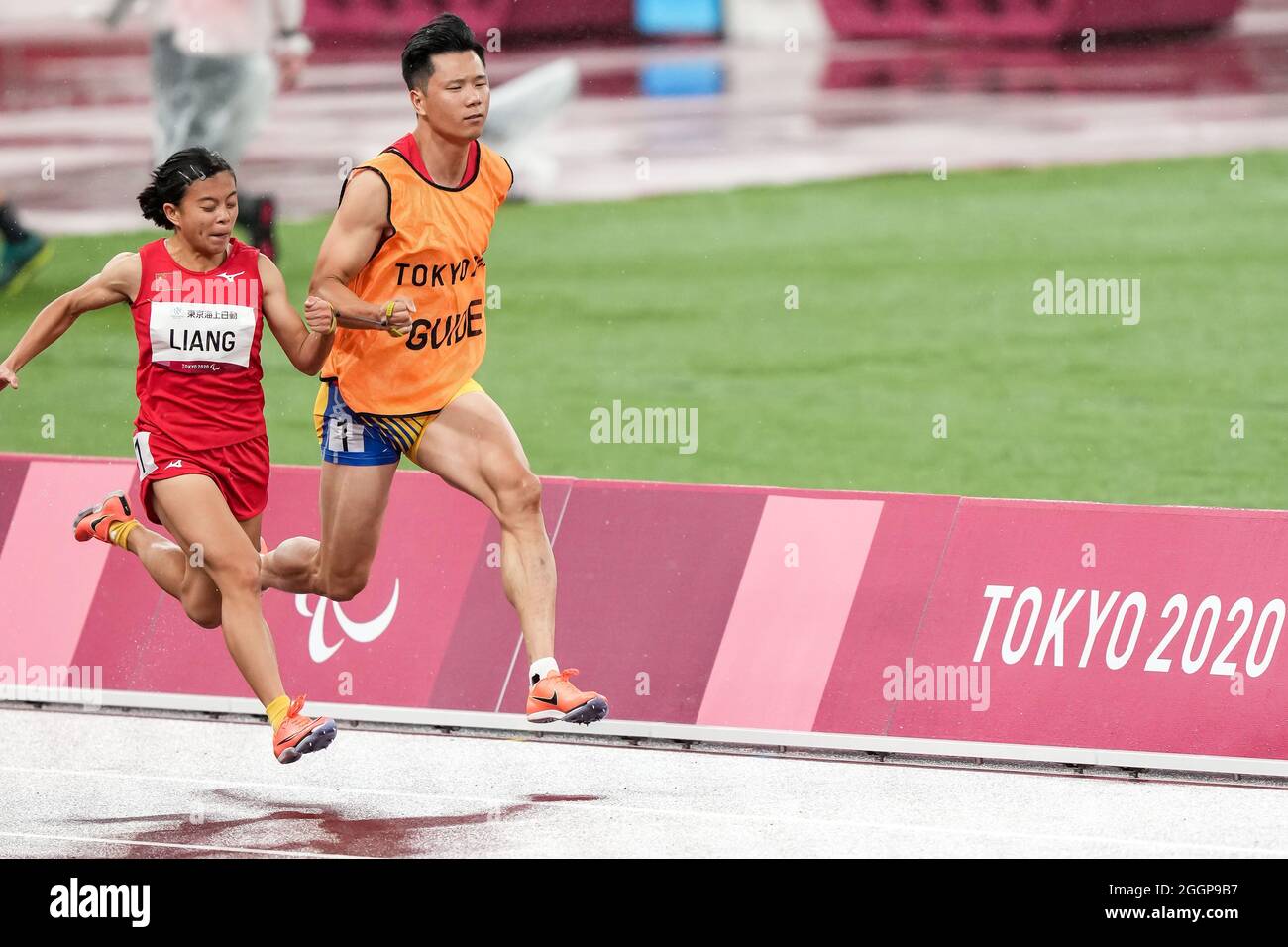 Tokyo, Japan. 2nd Sep, 2021. China's Liang Yanfen (L) and her guide Zhu ...