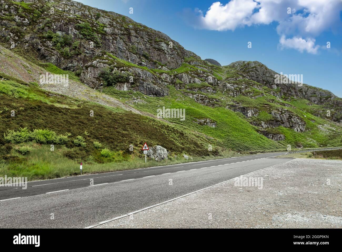 A winding road in the high mountains of Scotland Stock Photo - Alamy