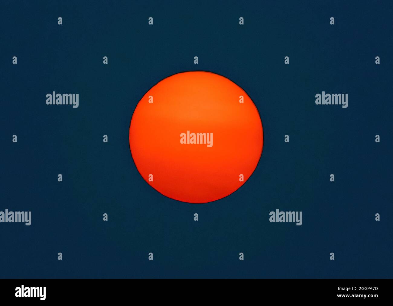 The Sun in bright red and orange color, with a dark background. Oregon ...