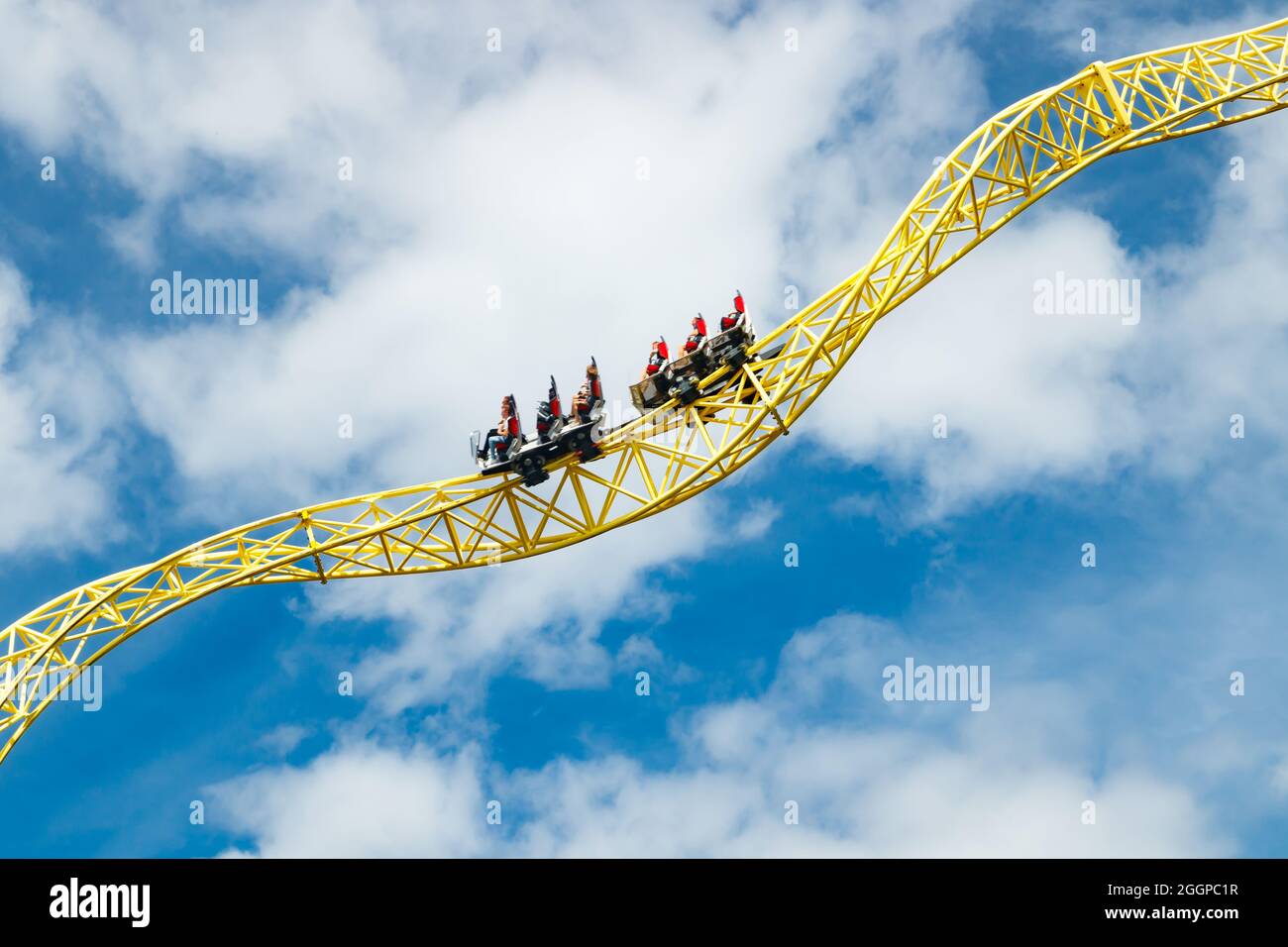Ride roller coaster in motion in amusement park Stock Photo - Alamy