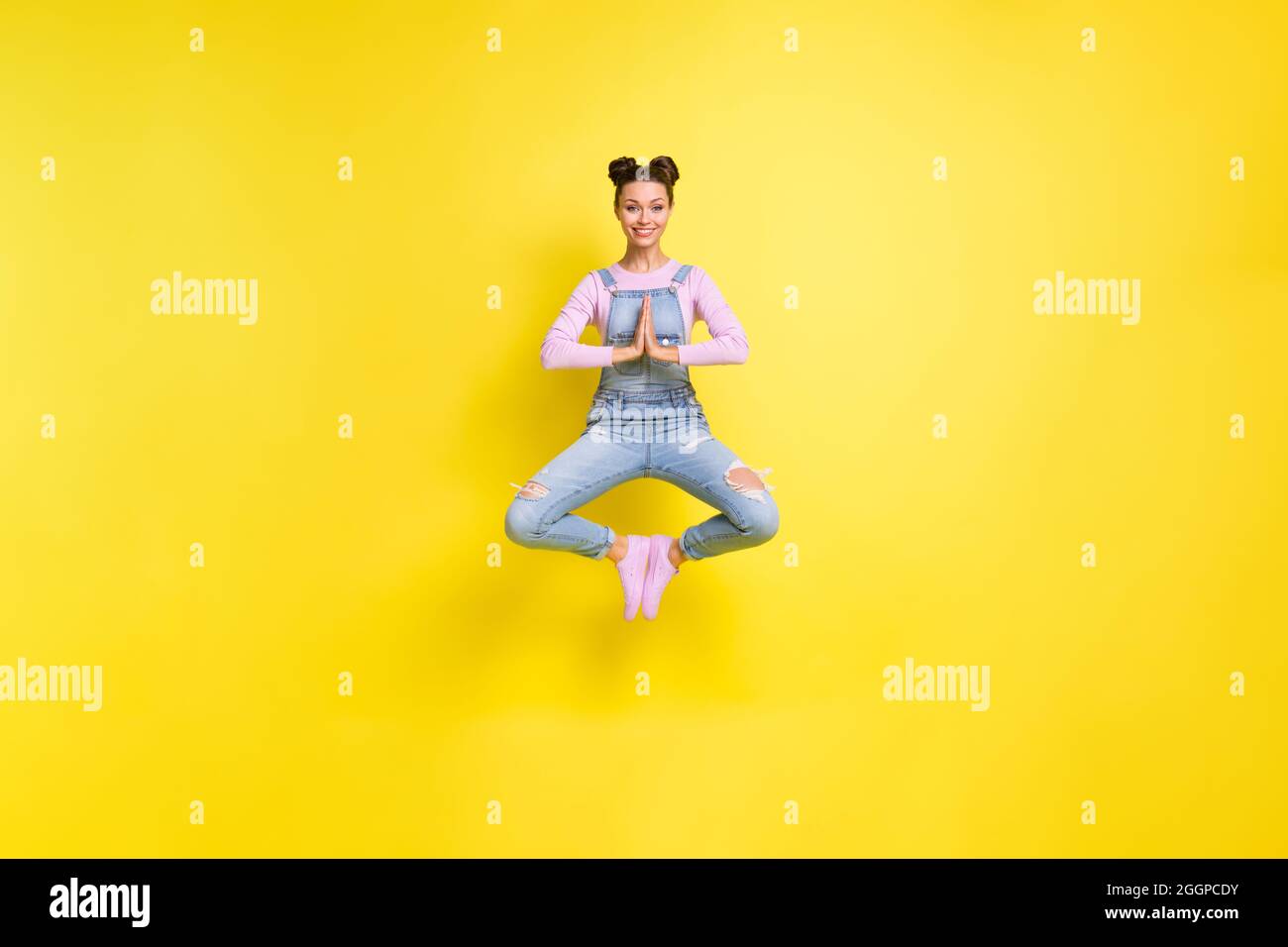 Full size photo of cheerful active young woman hold hands clap jump up ...