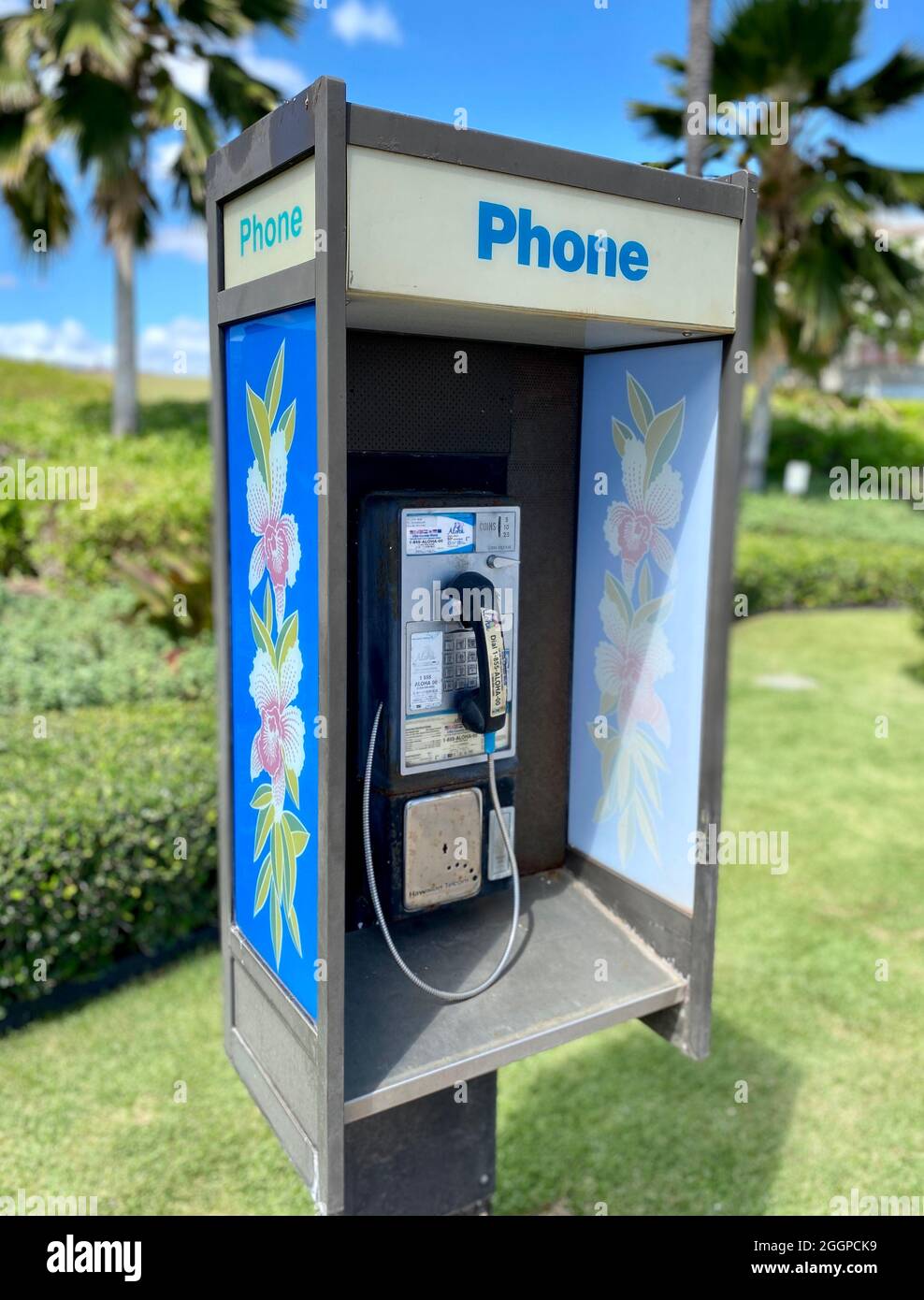 Payphone along a beach path in Hawaii Stock Photo - Alamy