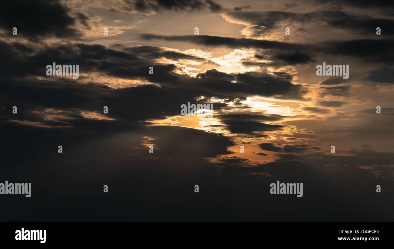 Beautiful sunset sky on a cloudy day perfect for background Stock Photo ...