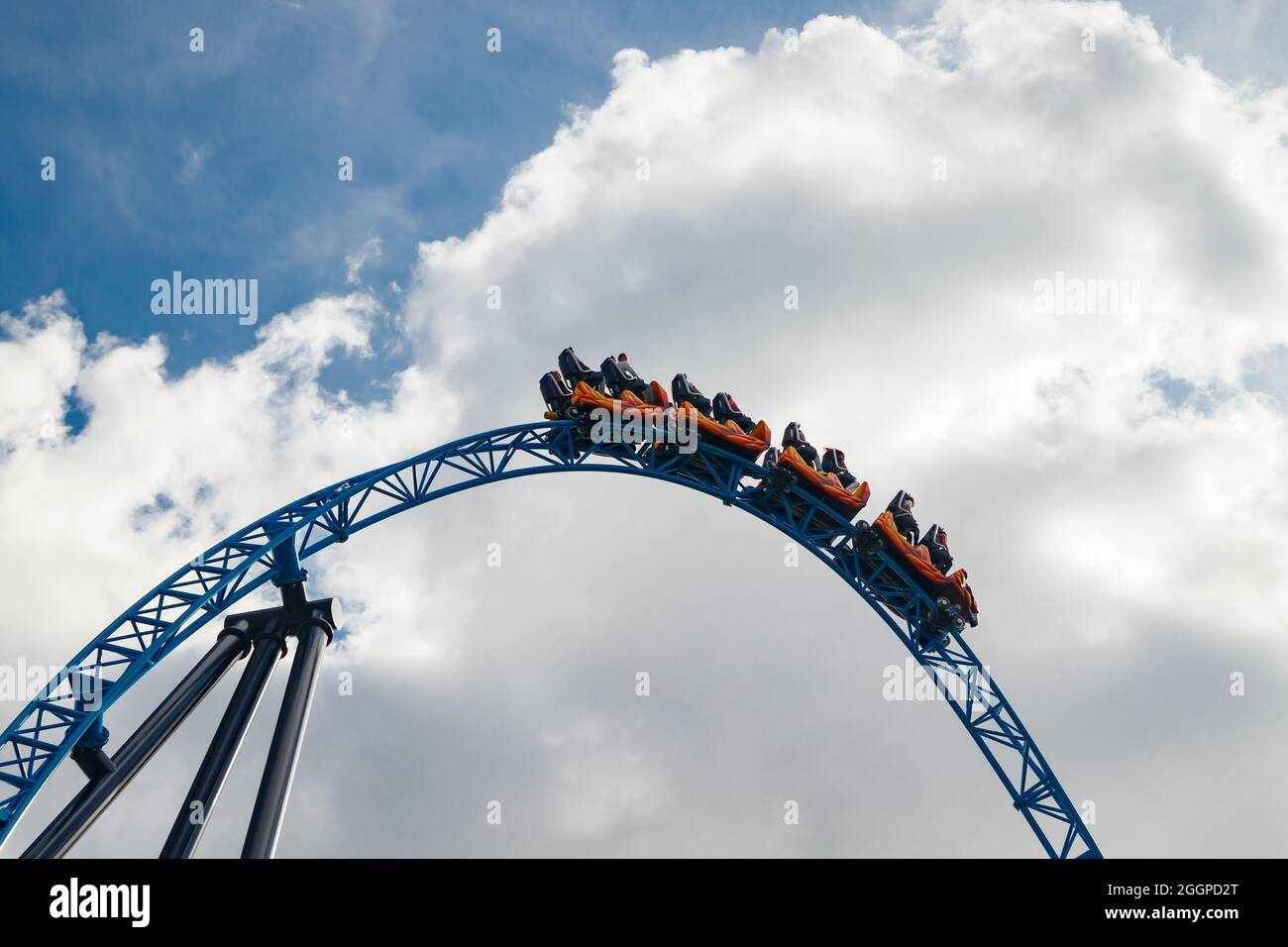 Ride roller coaster in motion in amusement park Stock Photo - Alamy