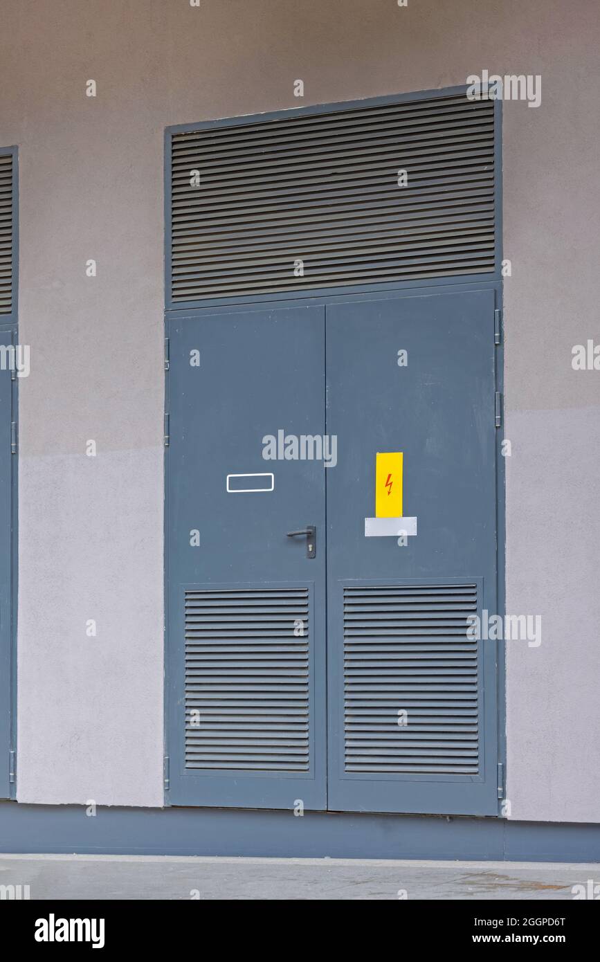 Electric Power Substation Door With Danger Arrow Sign Stock Photo - Alamy