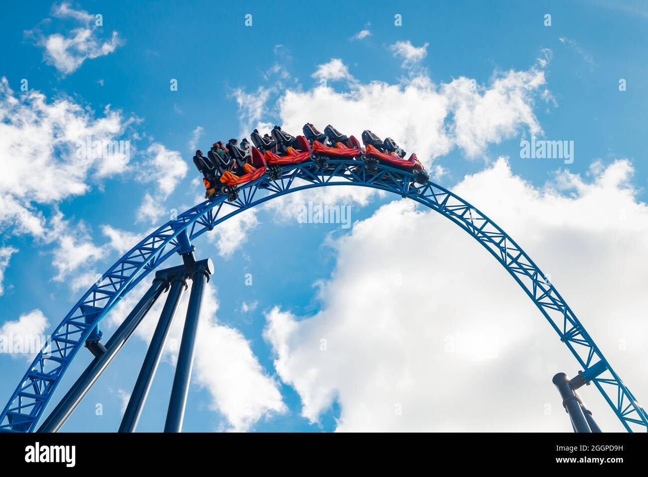 Ride roller coaster in motion in amusement park Stock Photo - Alamy