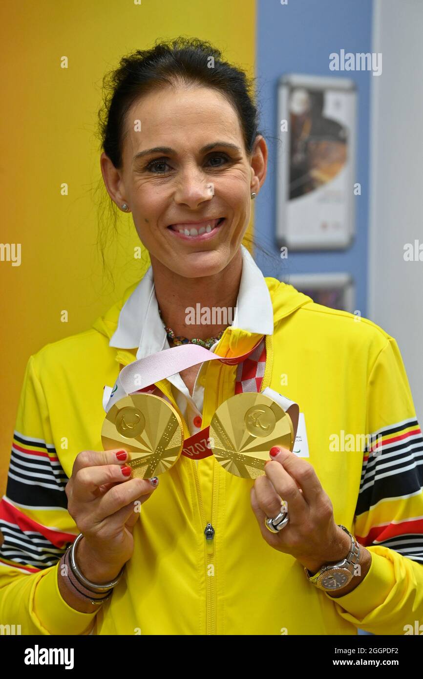 Belgian jockey Michele George and her two medals seen at the return of ...