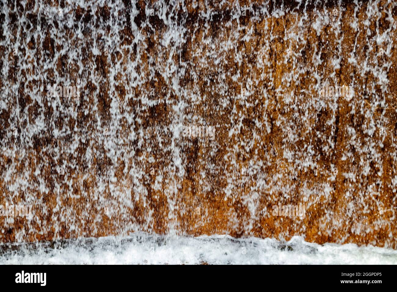 Texture of a flowing waterfall on the wall Stock Photo - Alamy