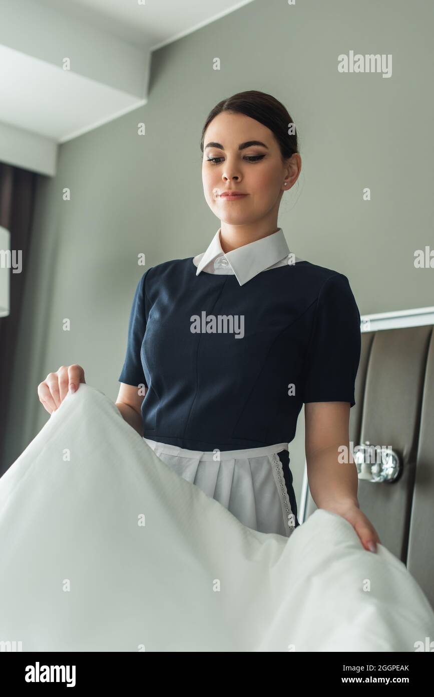Woman chambermaid in hotel bedroom hi-res stock photography and images ...
