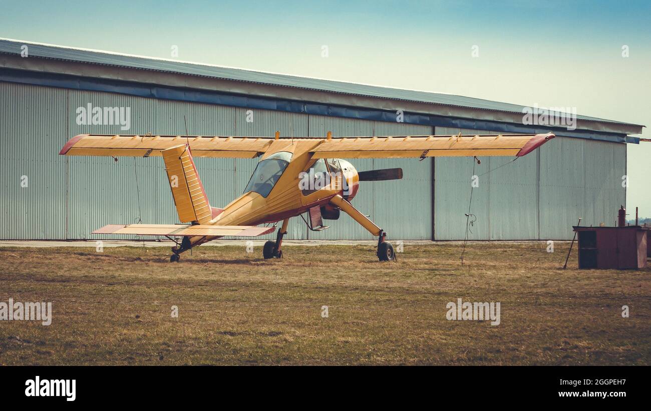 old vintage small plane at the airfield outdoors Stock Photo - Alamy