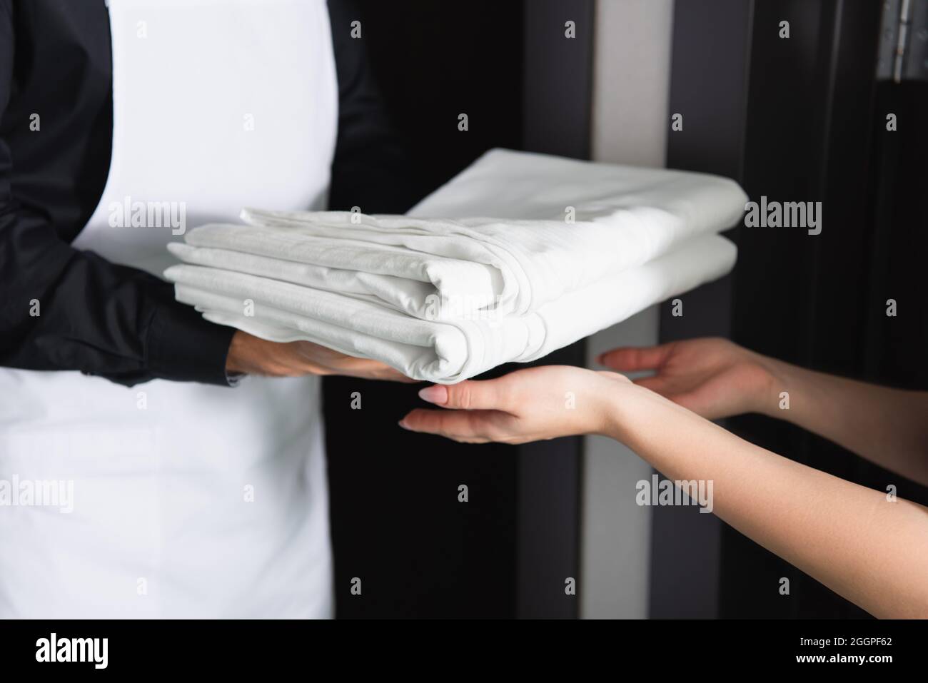Maid and sheets hi-res stock photography and images - Alamy