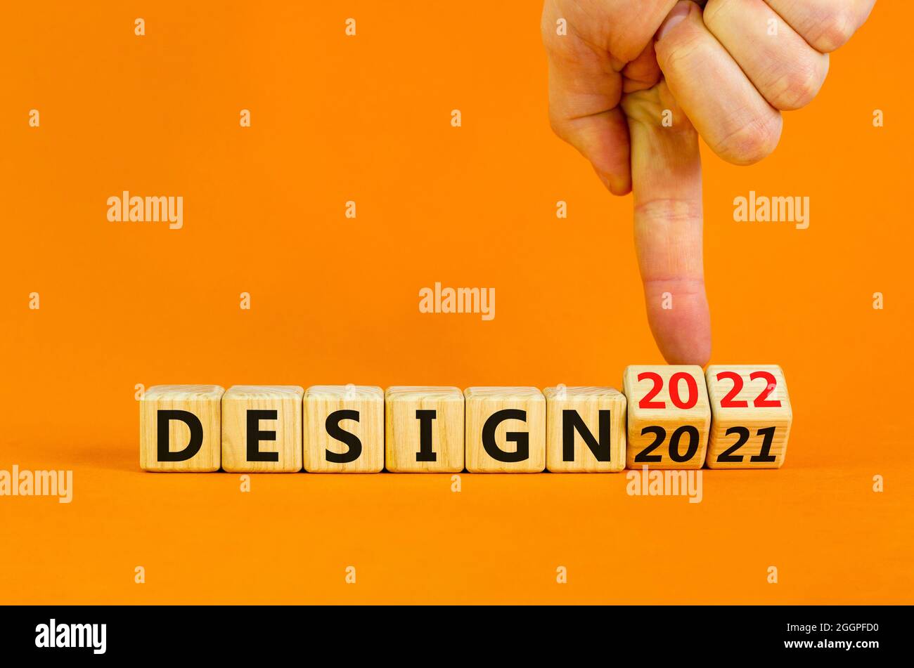Planning 2022 design new year symbol. Businessman turns wooden cubes ...