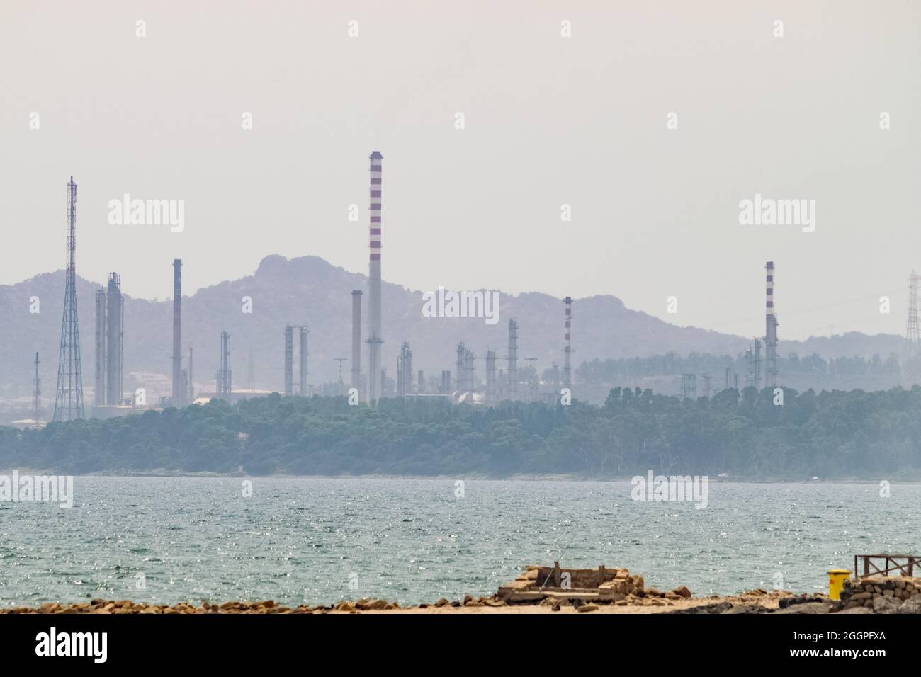 View of a refinery near the sea coast Stock Photo - Alamy