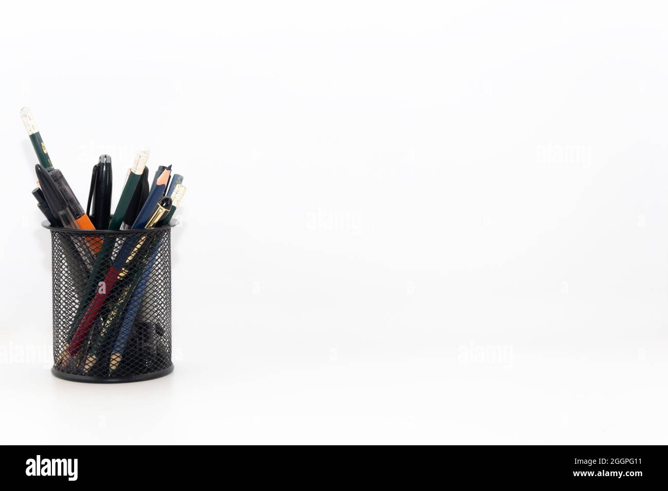 pencil holder on white background Stock Photo - Alamy