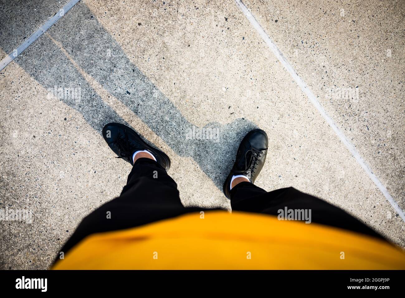 Male feet in black hi-res stock photography and images - Alamy