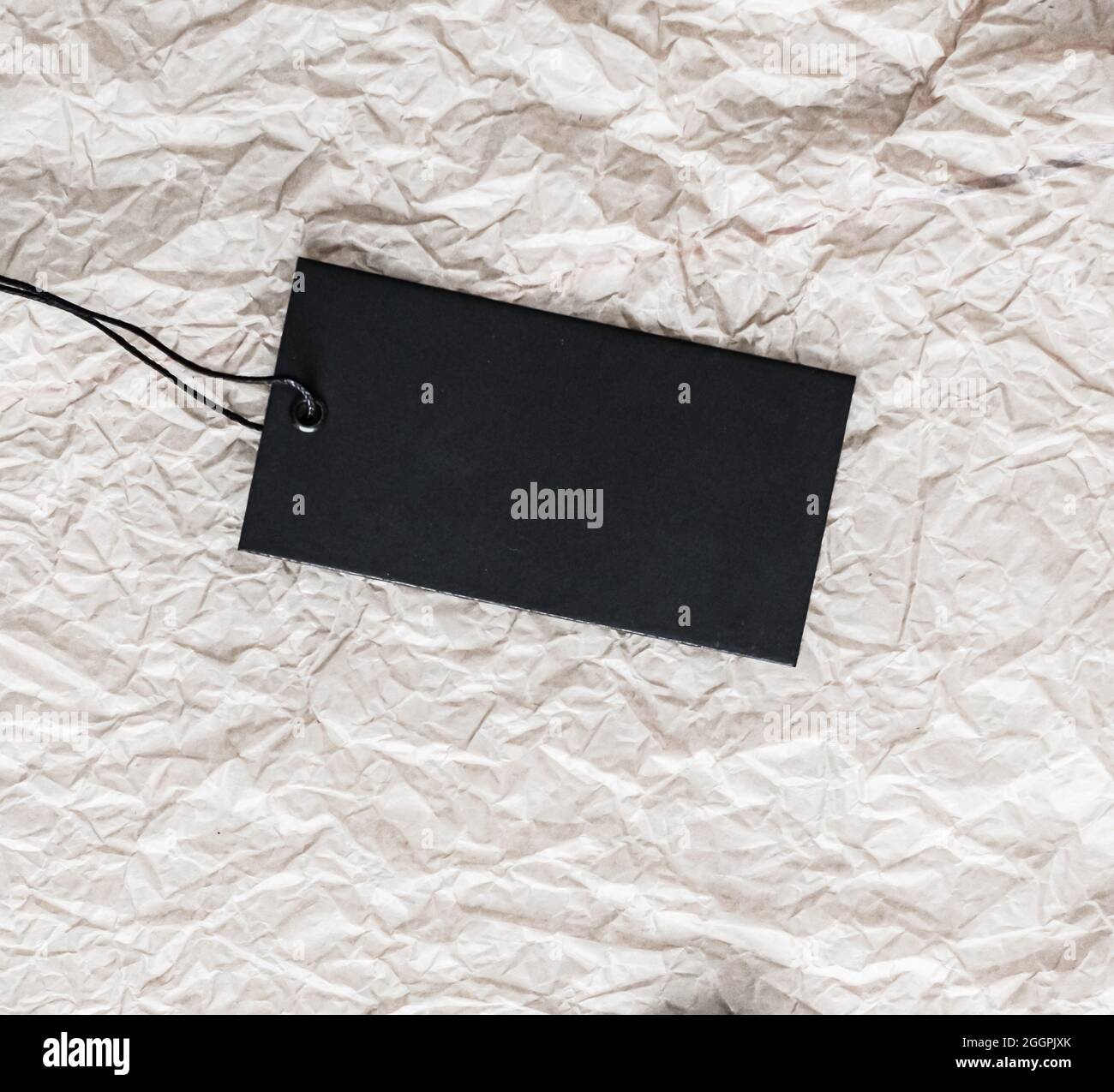 Black horizontal price tag on paper background Stock Photo - Alamy