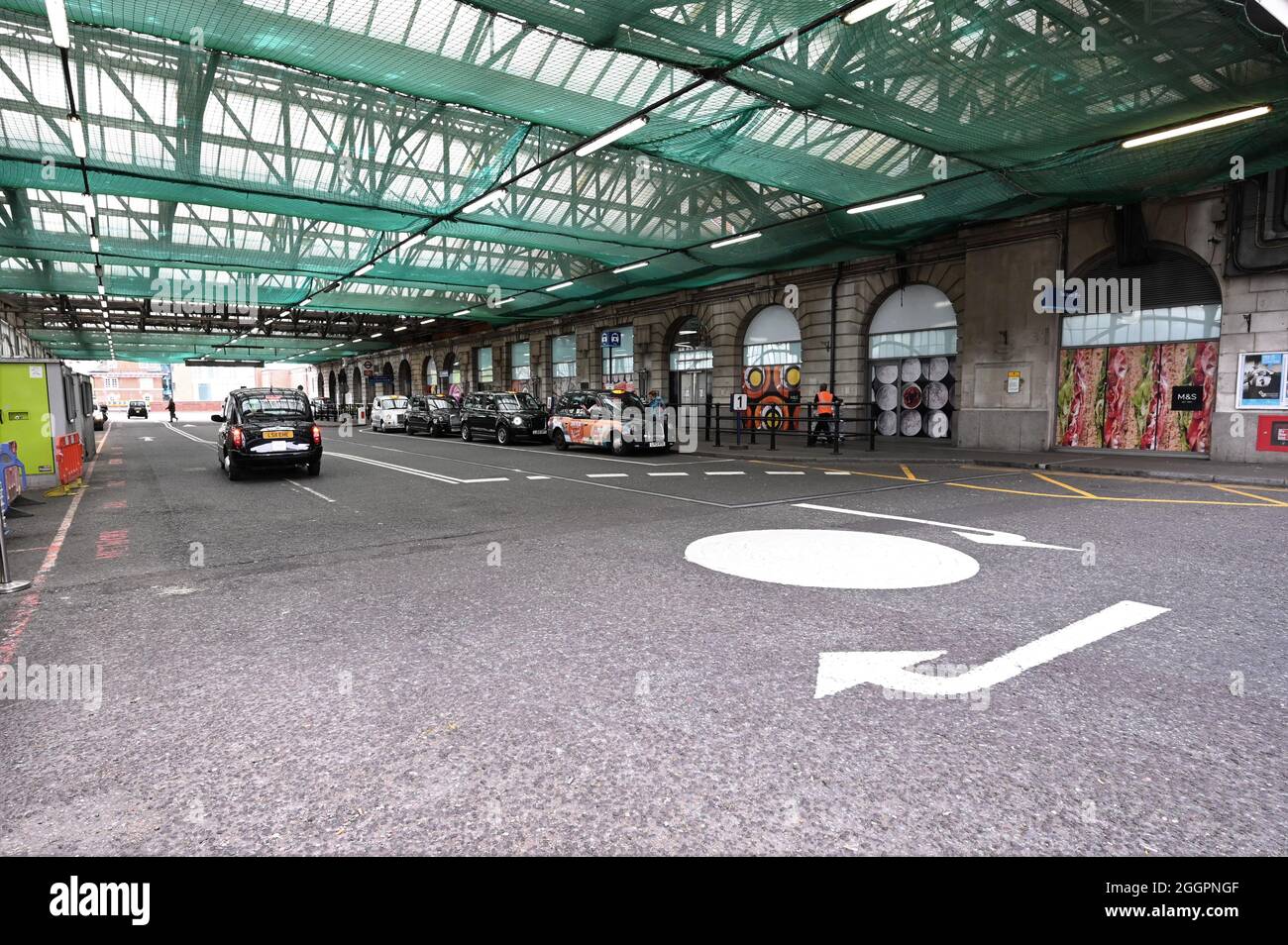 Sept 2 2021: Black cabs and taxis pulling into and leaving Cab Road at ...