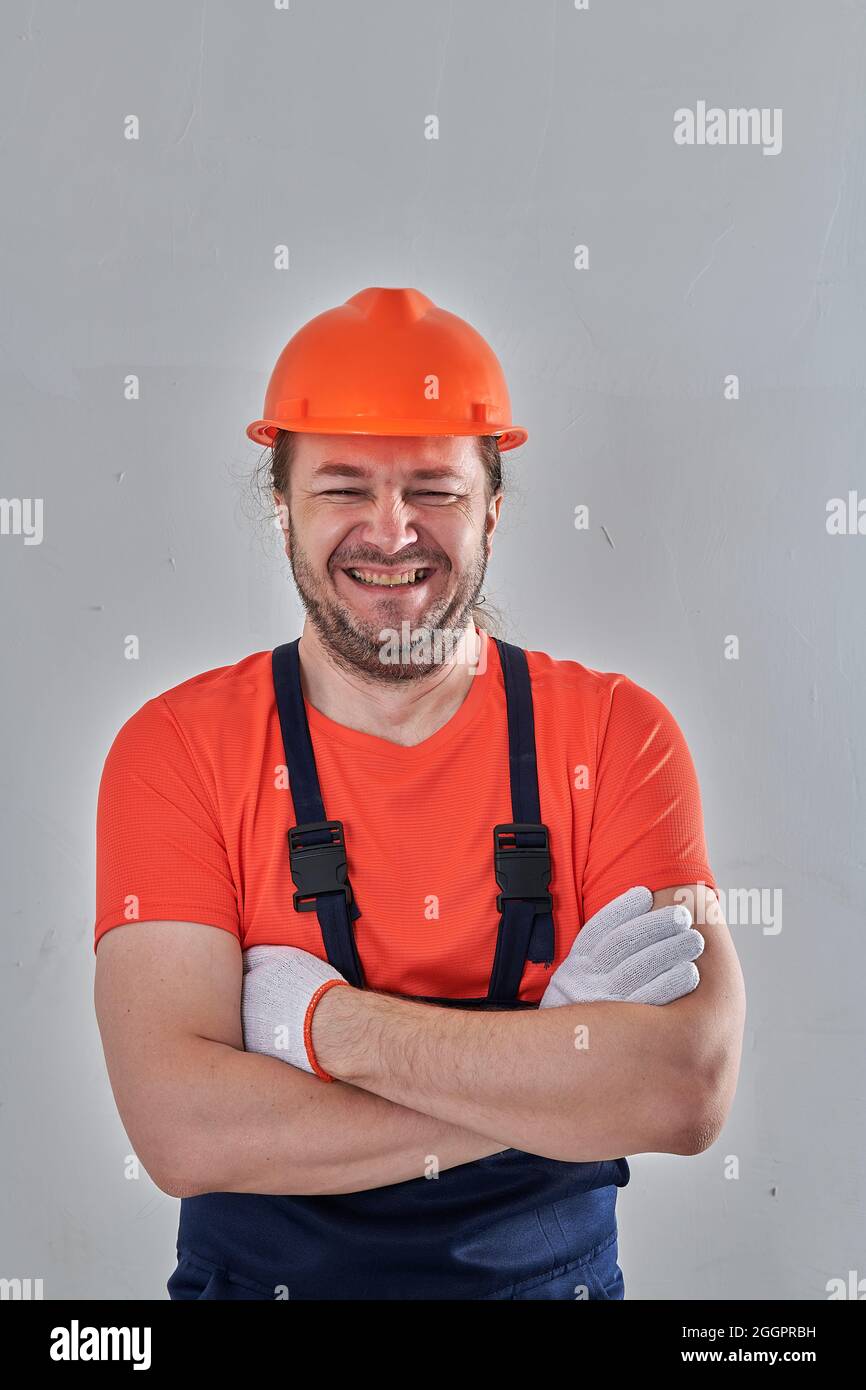 Man in construction helmet orange hi-res stock photography and images ...