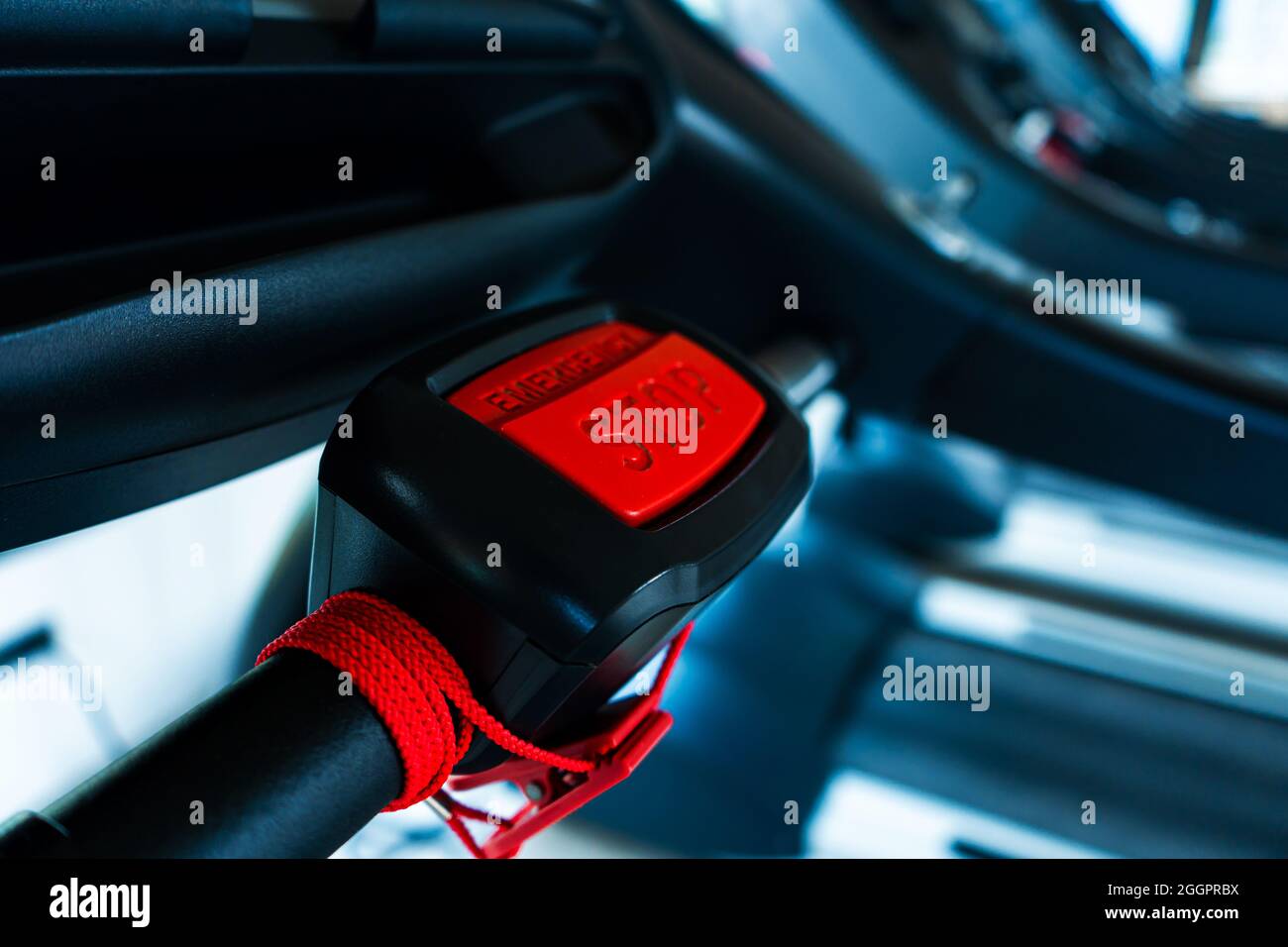 Close-up, red button with the inscription stop. Treadmill safety Stock ...