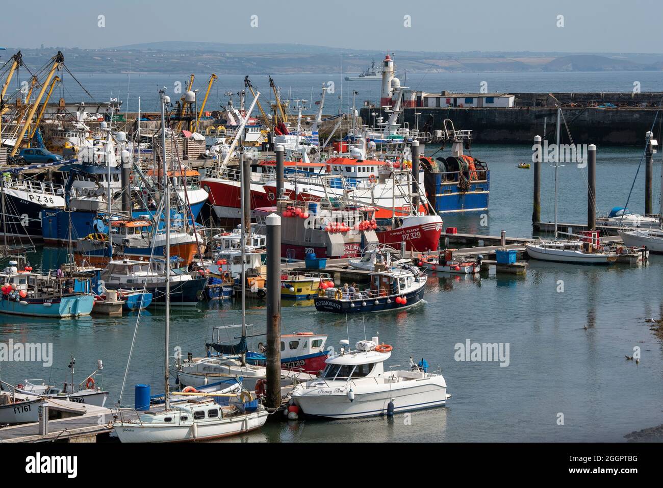 Newlyn, Cornwall, England, UK. 2021. A small ferry boat with passengers ...