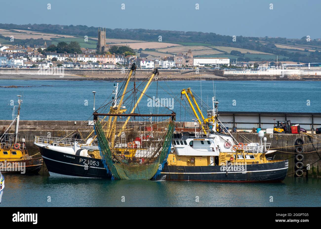 Newlyn, Cornwall, England, UK. 2021. Fishing trawlers alongside the ...