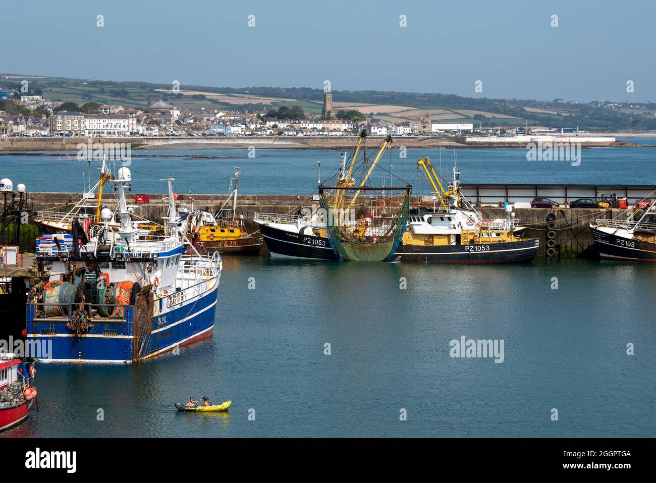 Newlyn, Cornwall, England, UK. 2021. Fishing trawlers alongside the ...