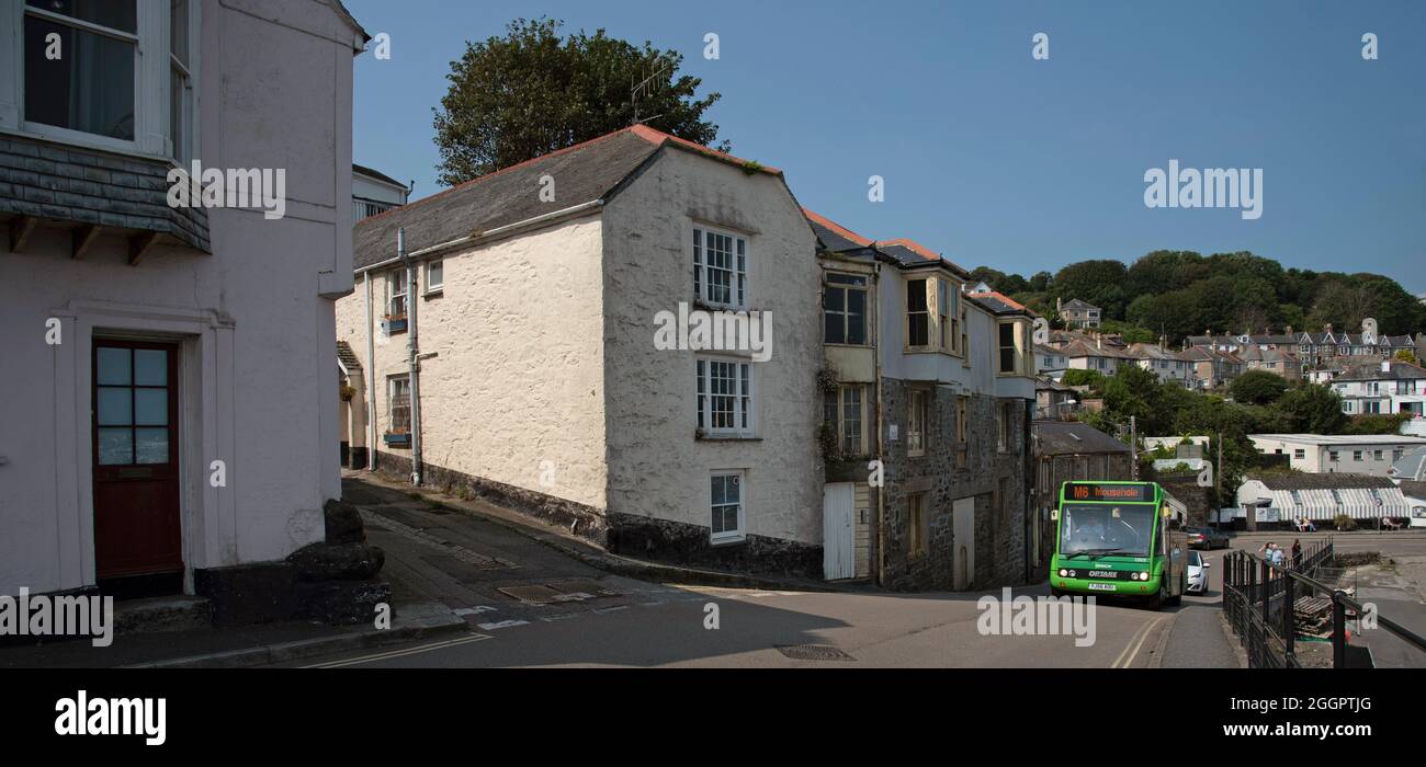 Newlyn, Cornwall, England, UK. 2021. Green bus travelling on the ...