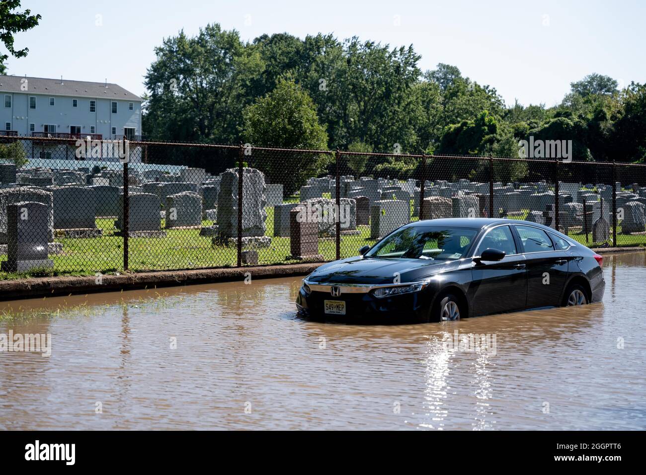 Lodi, USA. 02nd Sep, 2021. A car abandoned during flooding following ...