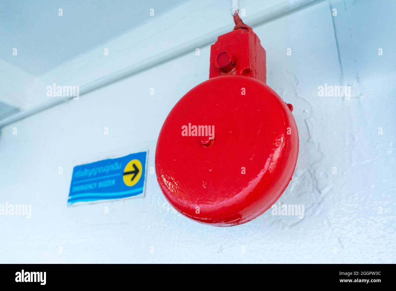 Old red fire bell on the wall. Fire safety Stock Photo - Alamy