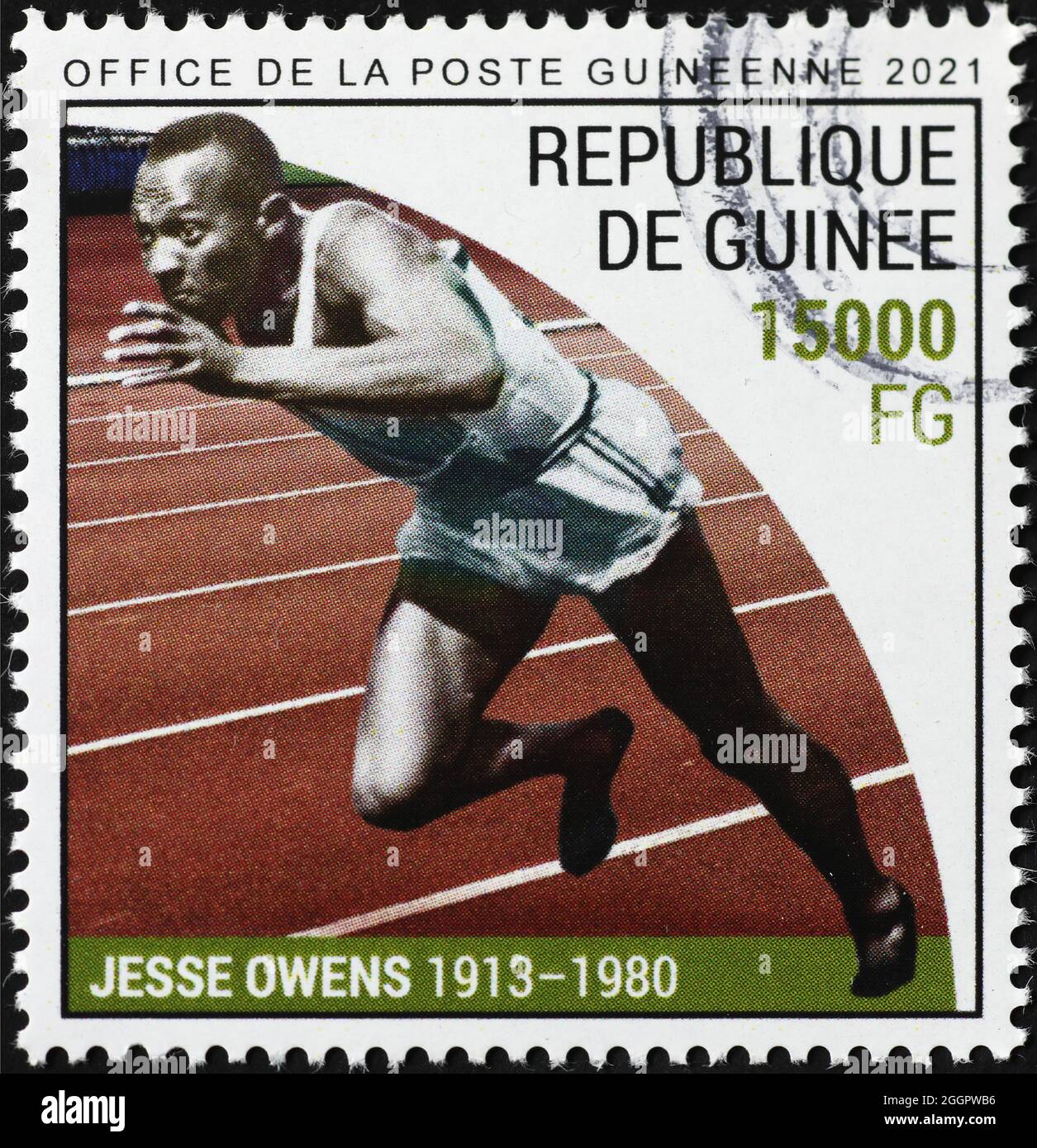 Jesse Owens sprinting on postage stamp Stock Photo - Alamy