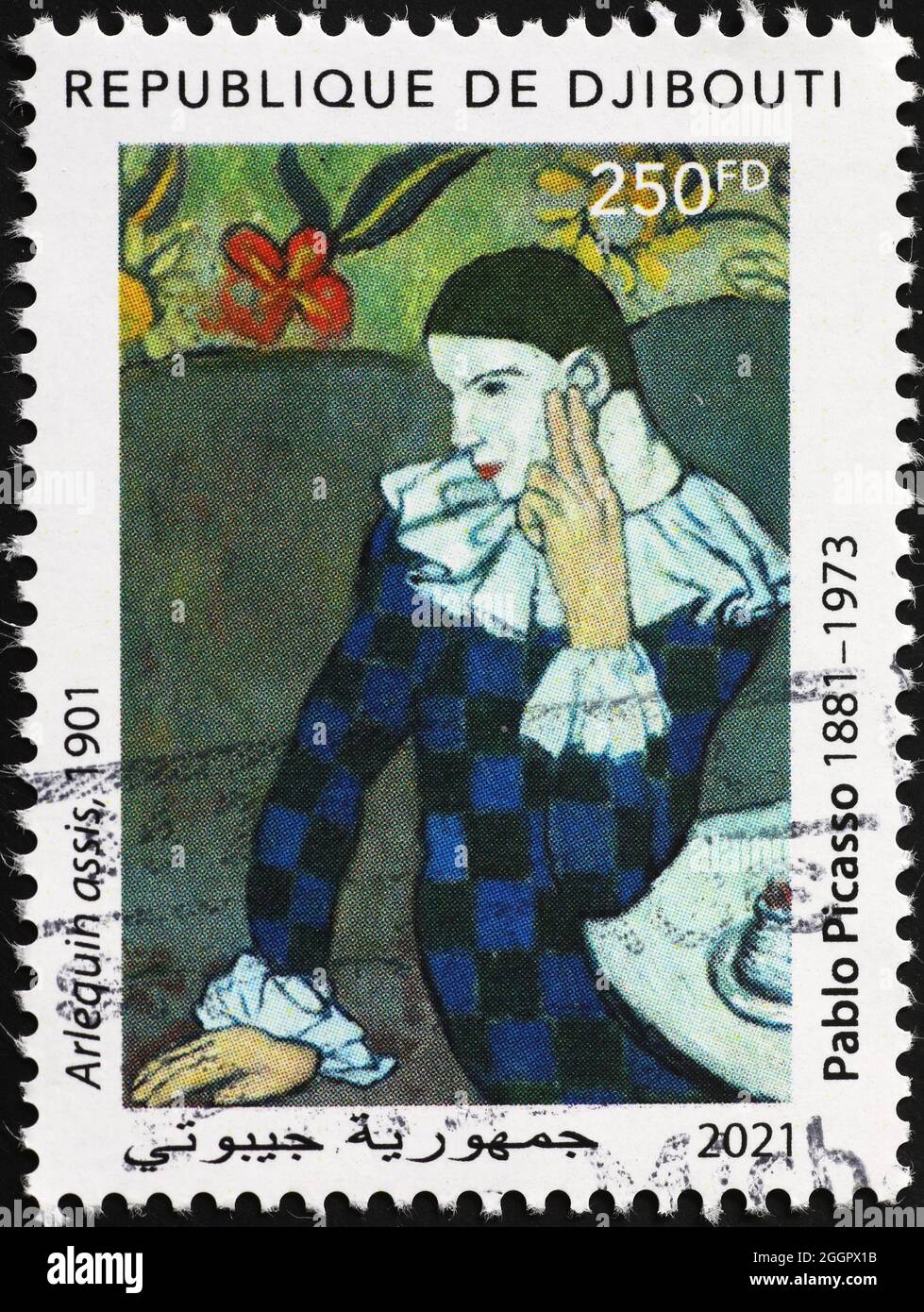Seated harlequin by Pablo Picasso on postage stamp Stock Photo - Alamy