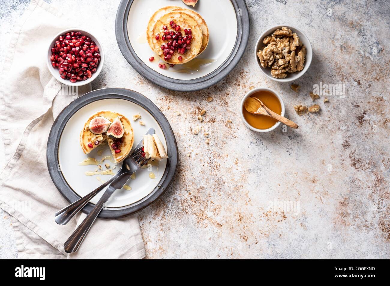 Beautifully served table for breakfast with many delicacies, cheeses ...