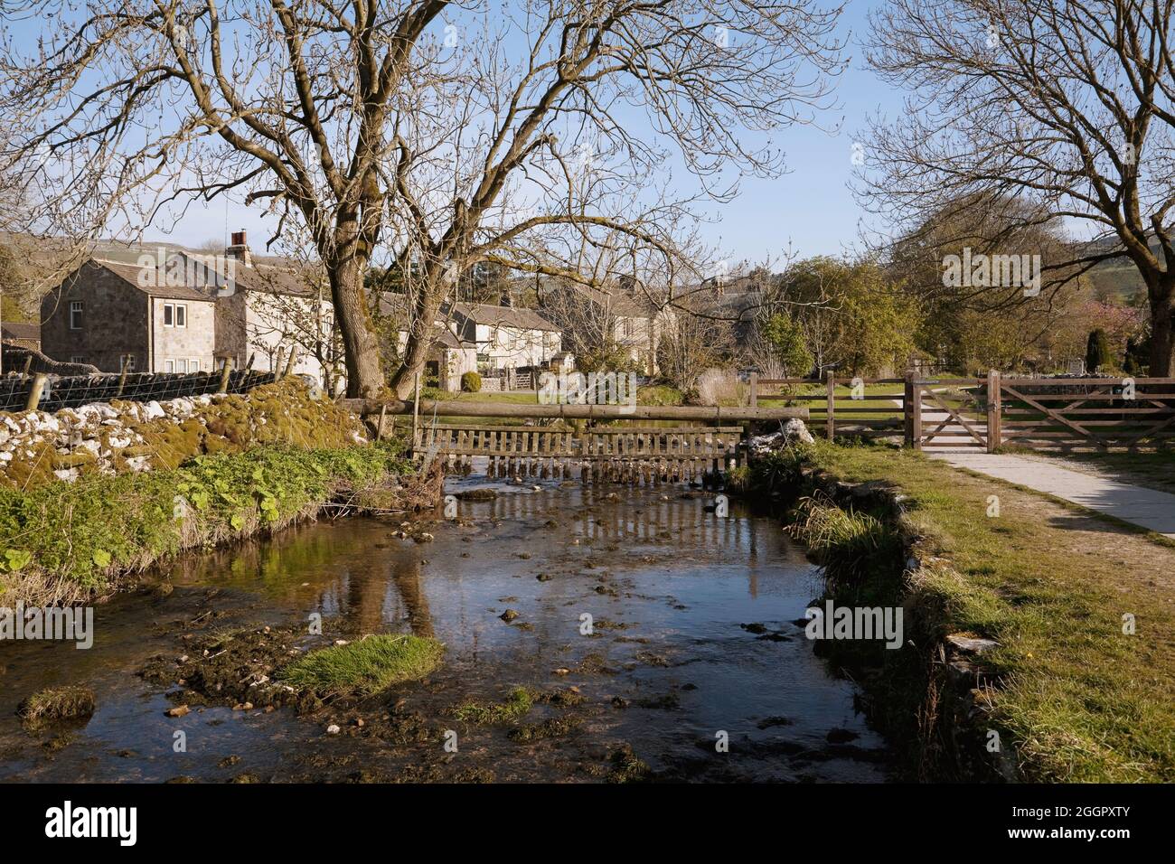 Malham village and Malham Beck in the Yorkshire Dales, UK Stock Photo ...