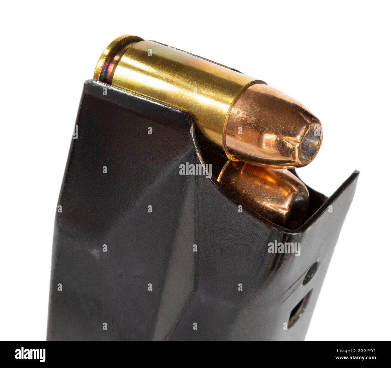 Bullets loaded into a pistol magazine and isolated on a white ...