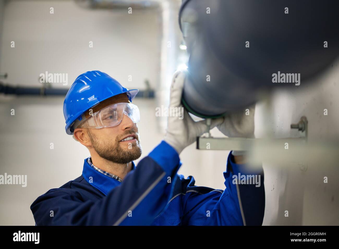 PVC Water Pipe Inspection By Construction Worker Stock Photo - Alamy