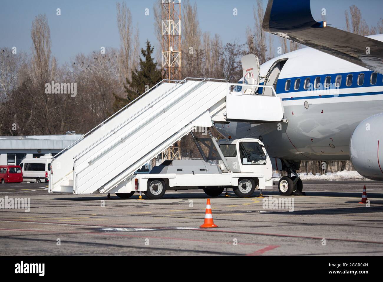Airplane on an airport landing strip hi-res stock photography and ...