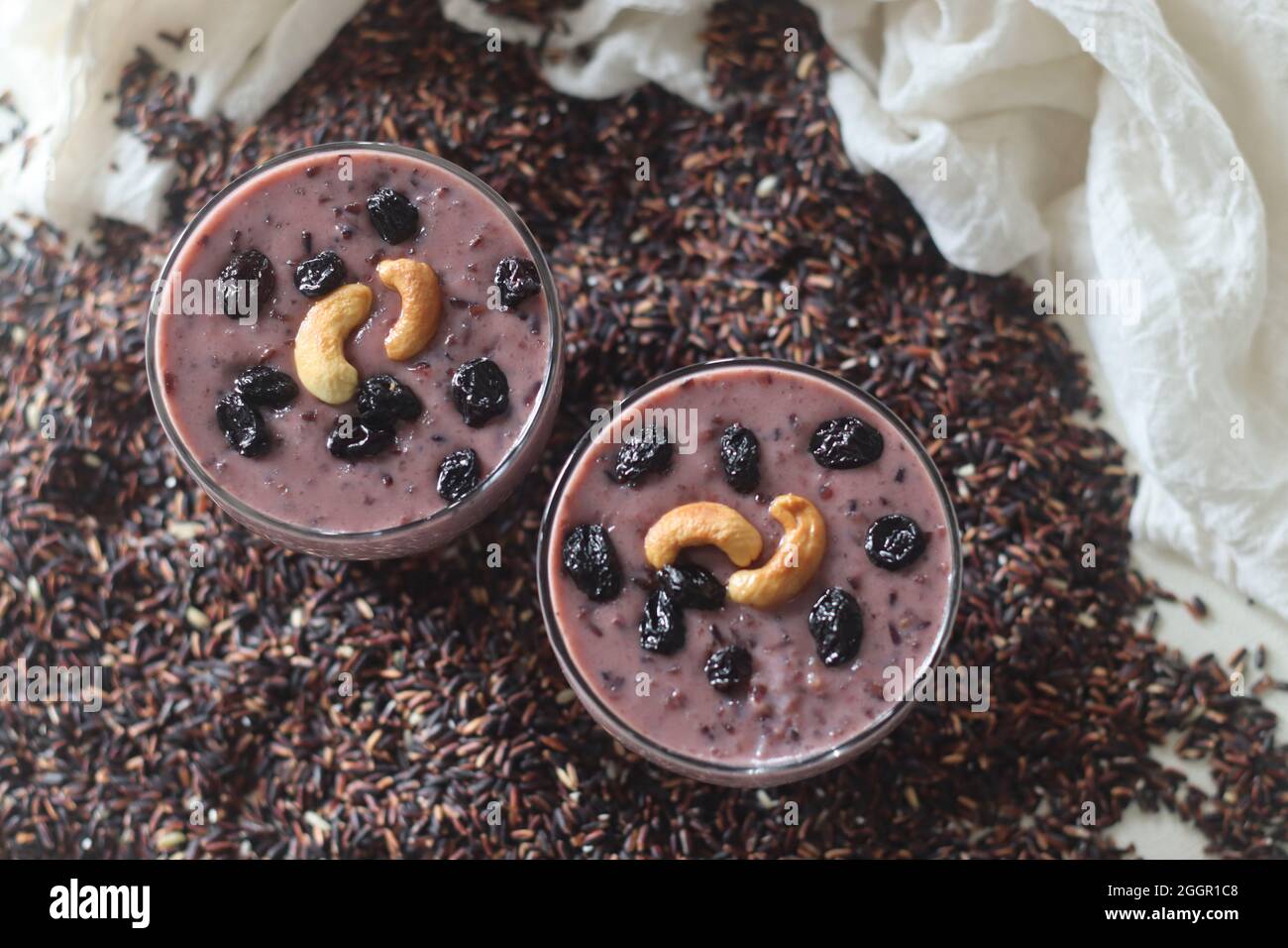 Black rice pudding. Made with black rice simmered in milk, sweetened ...