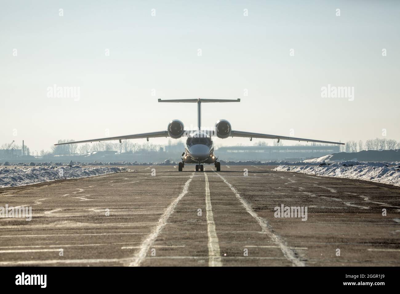 Cargo plane in the winter on the runway. Cargo plane at the airport ...