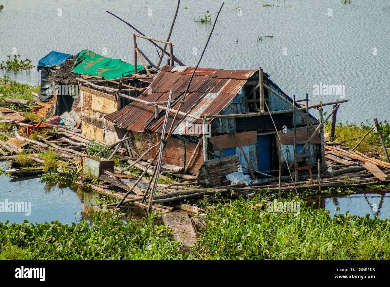 One of poor houses of a shantytown in Iquitos, Peru Stock Photo - Alamy