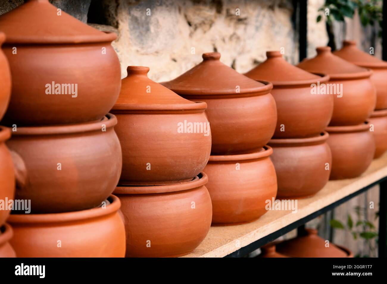 Handmade clay pots. These pots are mostly used in Asian cooking or sold ...