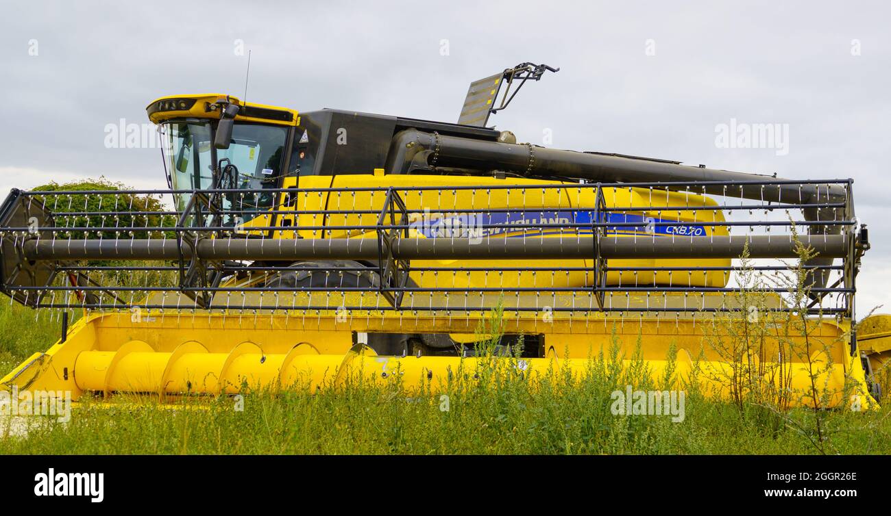Farmer on combine harvester header hi-res stock photography and images ...
