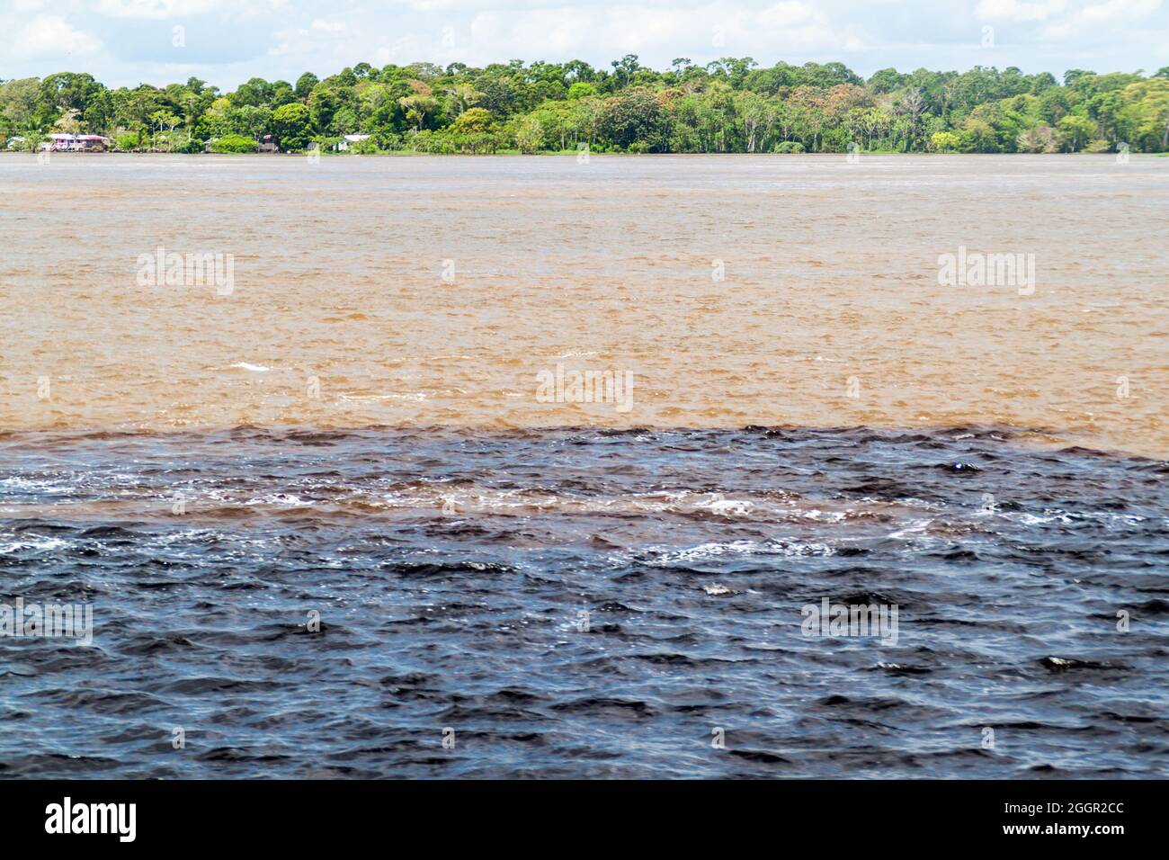 The Meeting of Waters (Encontro das Aguas) is the confluence between the Rio Negro river, with ...