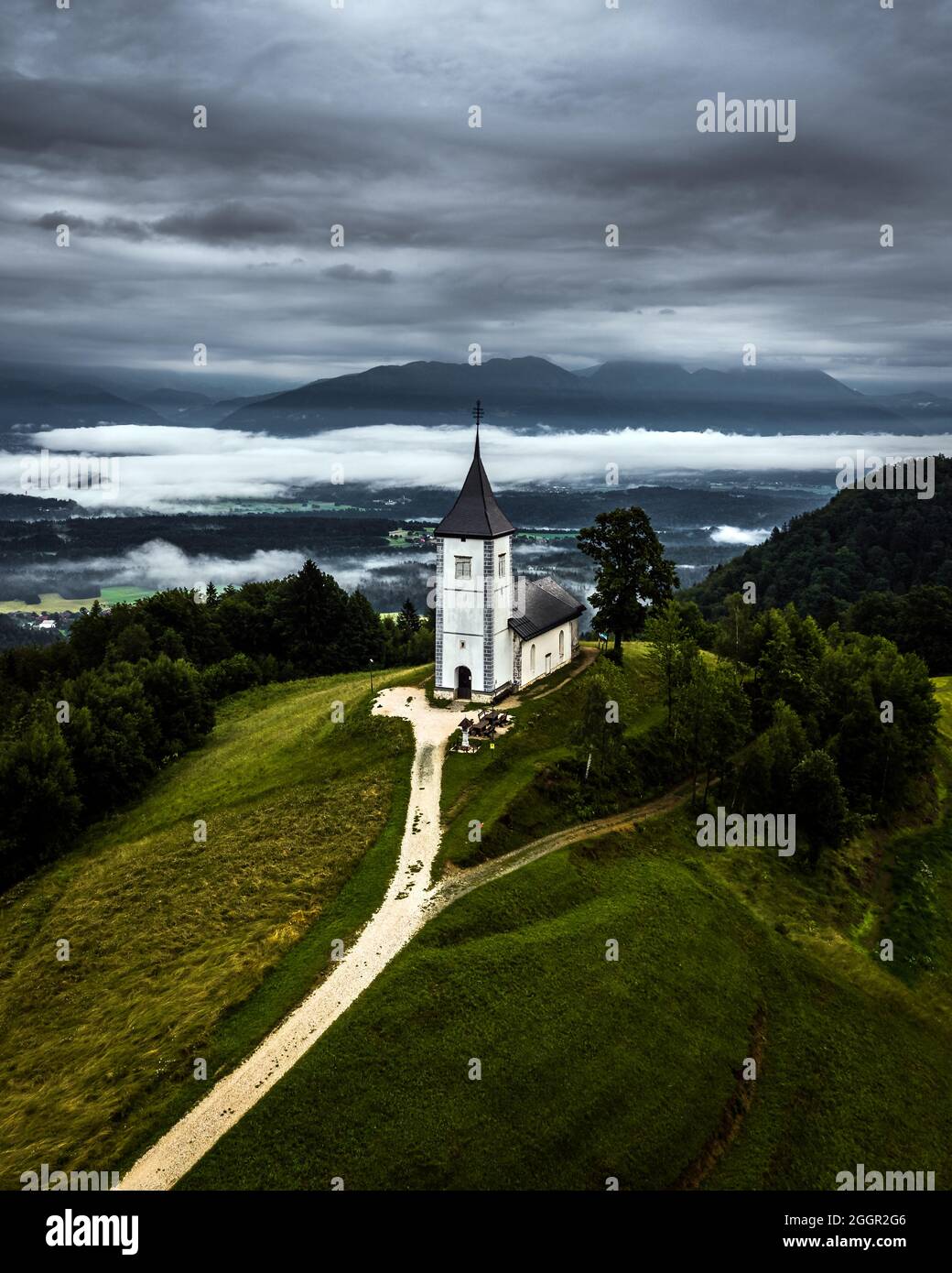 Jamnik, Slovenia - Aerial drone view of a summer sunrise at Jamnik St ...