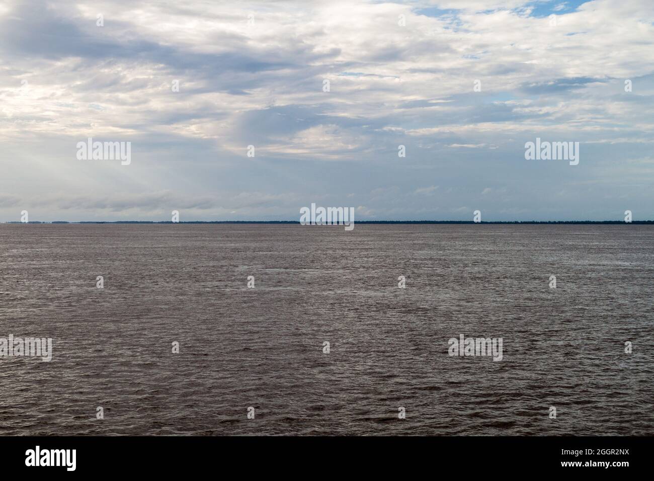 Cloudy sky and Amazon river, Brazil Stock Photo - Alamy