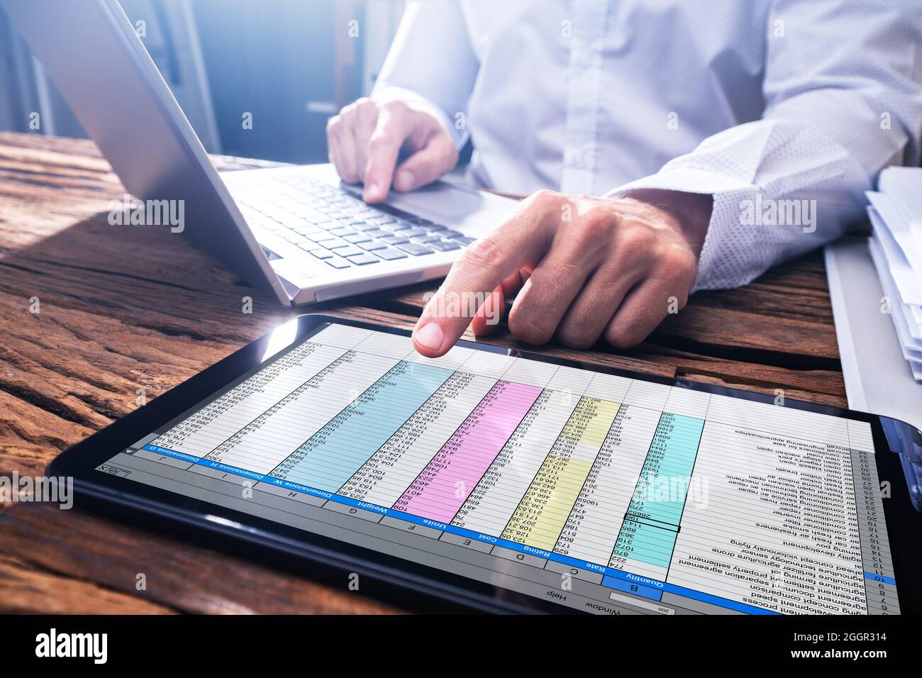 Electronic Spreadsheet On Analyst Computer Using Tablet Stock Photo - Alamy