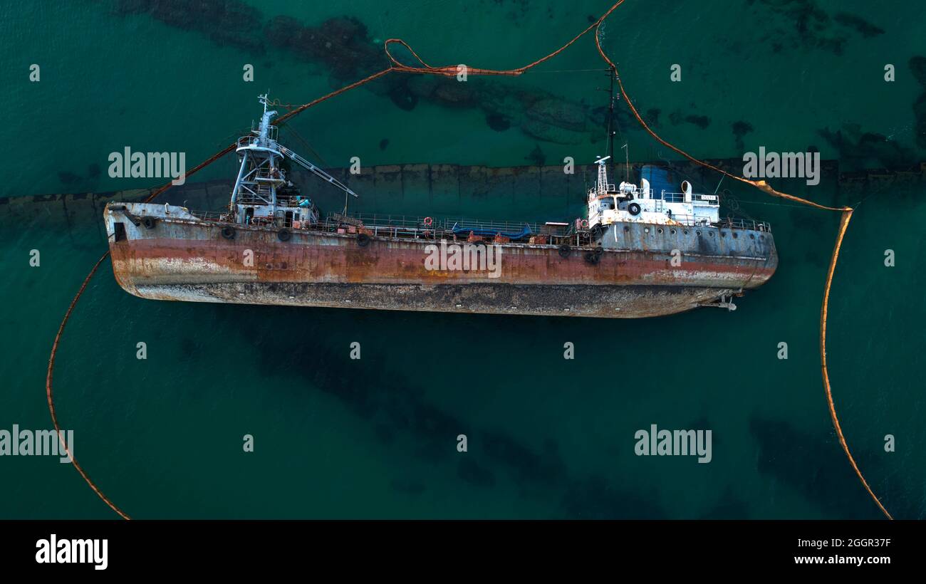 sunken tanker. Tanker Bunker threw storm ashore. The tanker lies on its ...