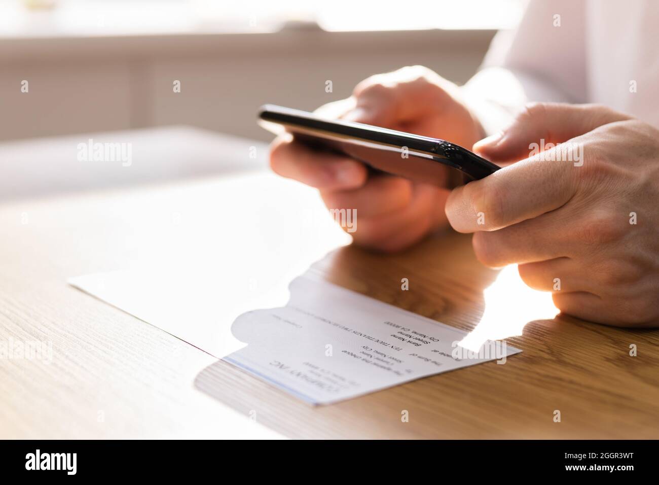 Remote Check Deposit Taking Photo With Mobile Phone Stock Photo - Alamy