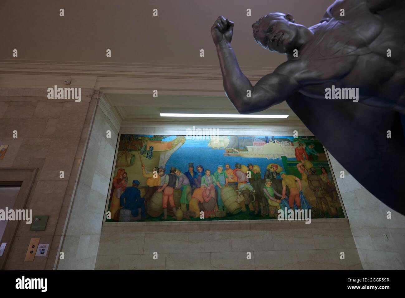 The mural and sculpture decorating the interior of the Main Library of ...
